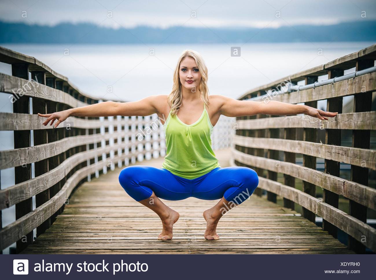 Woman Crouching In Front Open High Resolution Stock Photography and ...