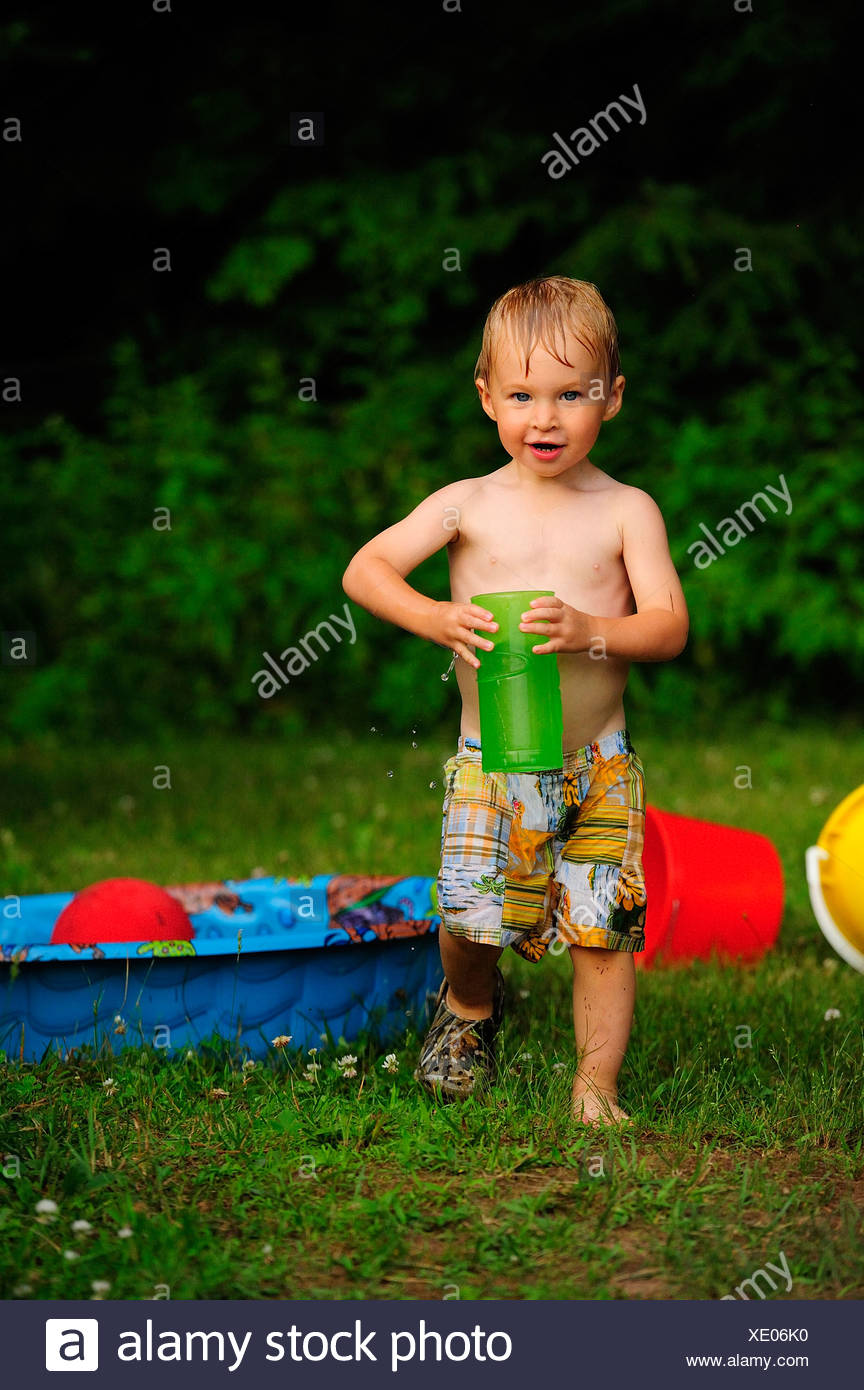 Boy Walking With Bucket High Resolution Stock Photography and Images ...