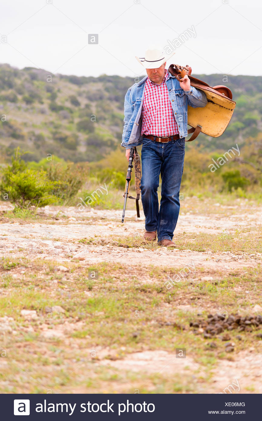 Cowboy With Rifle High Resolution Stock Photography and Images - Alamy