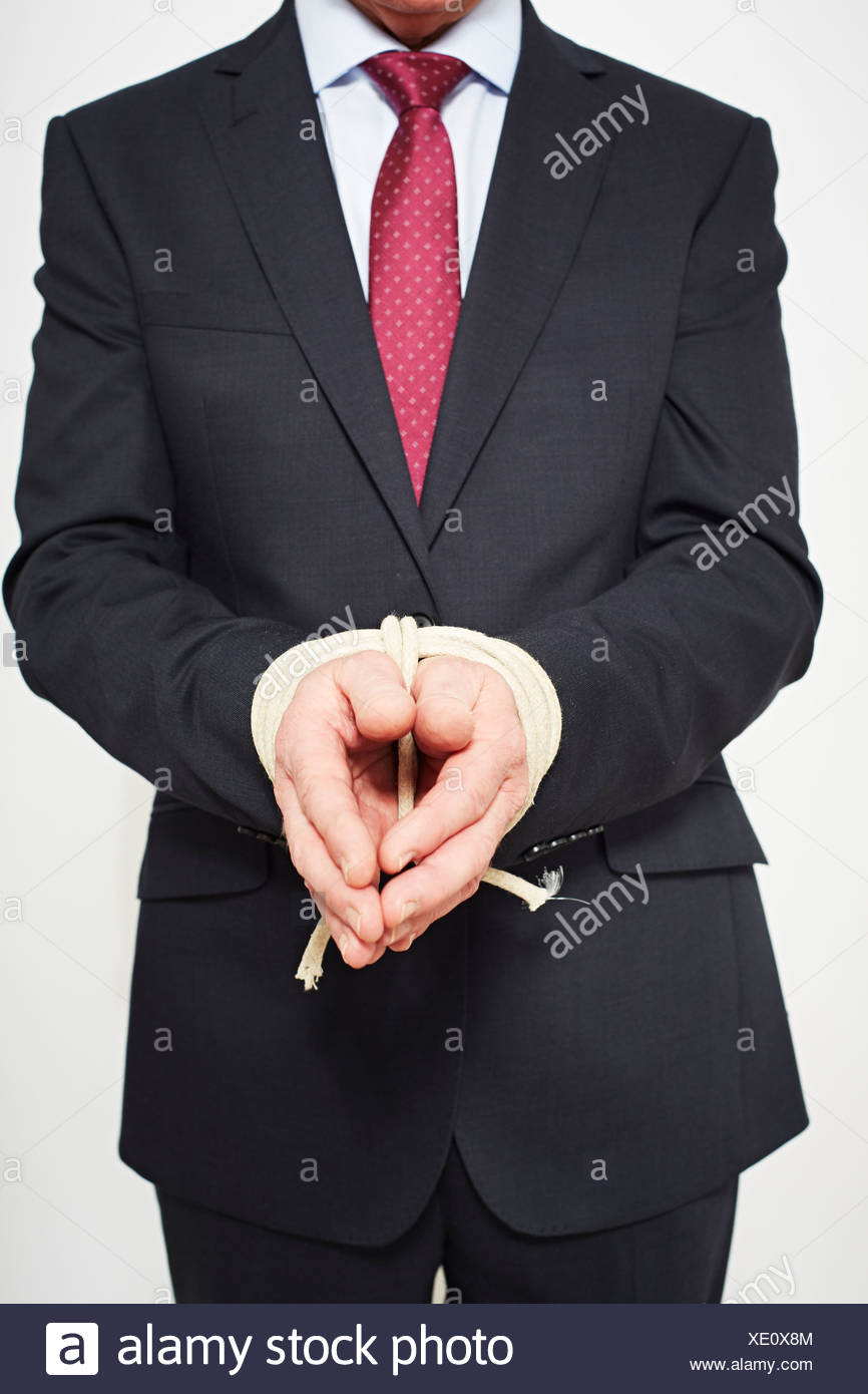 Tied Hands High Resolution Stock Photography and Images - Alamy