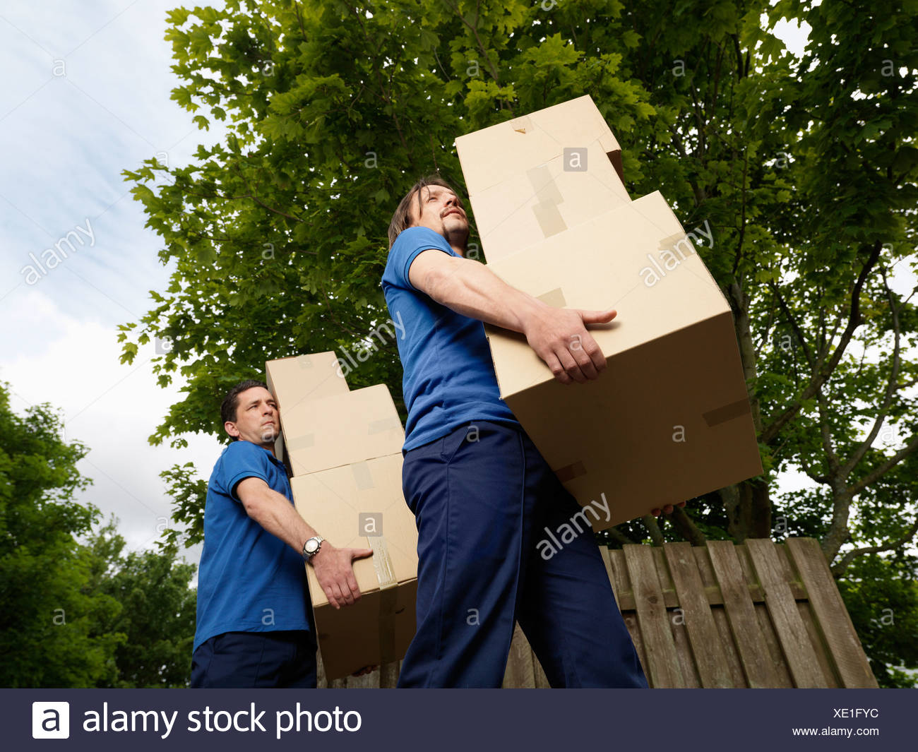 Person Carrying Box Walking High Resolution Stock Photography and ...