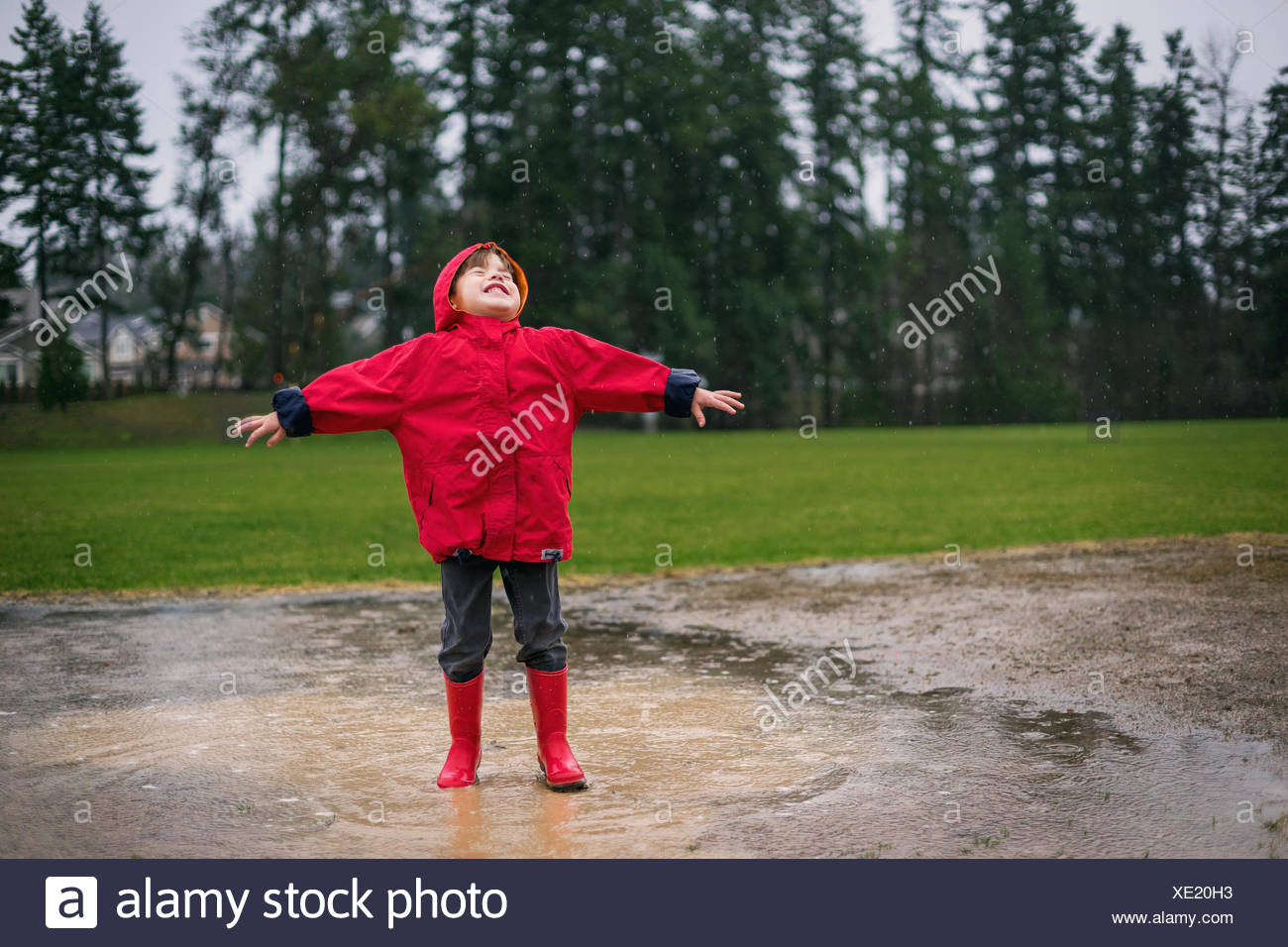 Boy In Puddle High Resolution Stock Photography and Images - Alamy