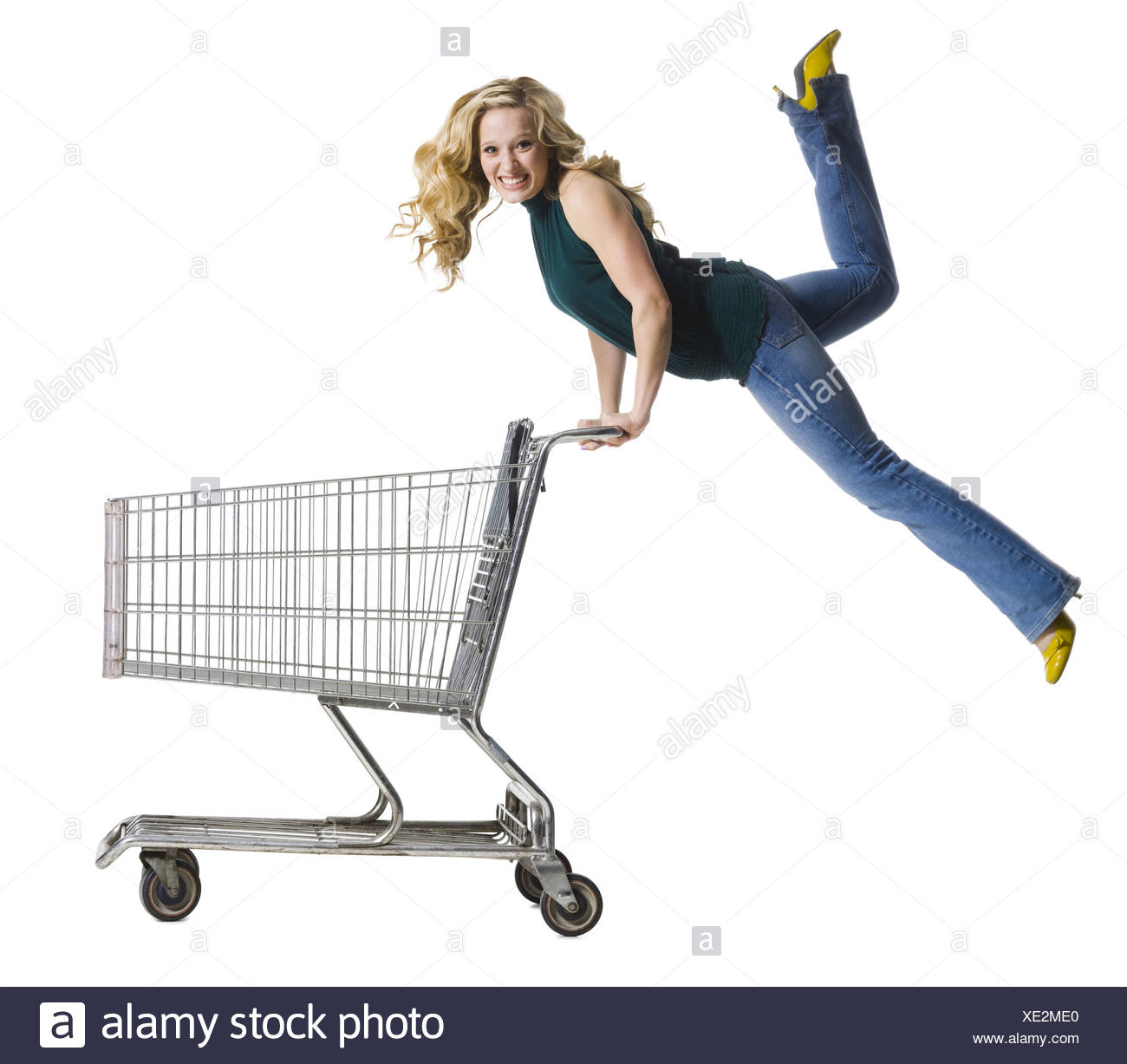Woman Pushing A Shopping Cart High Resolution Stock Photography and ...