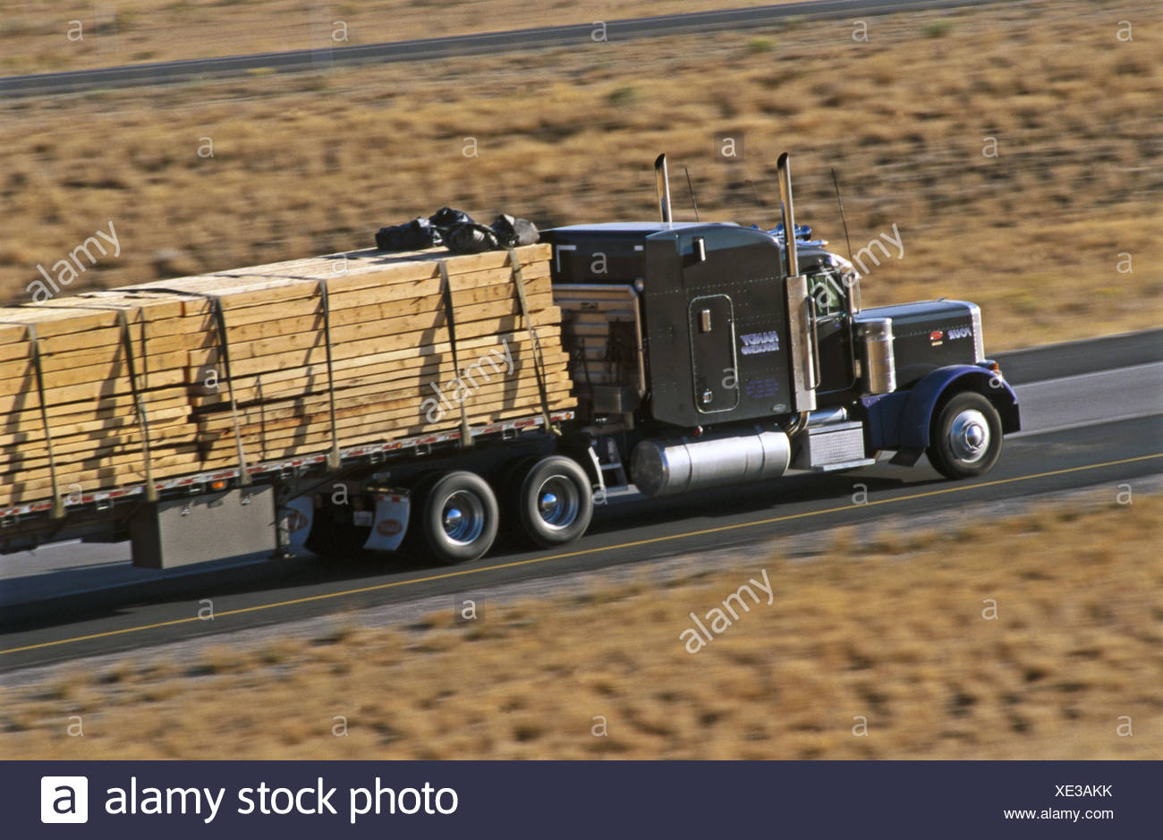 Truck Hauling Lumber Stock Photos & Truck Hauling Lumber Stock Images ...