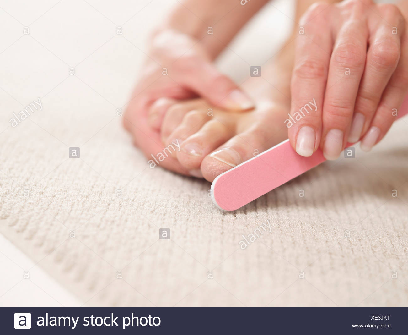 Mature Woman Filing Nails High Resolution Stock Photography and Images ...