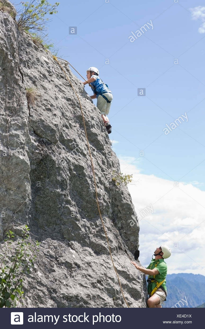 Boy Man Climbing Mountain High Resolution Stock Photography and Images ...