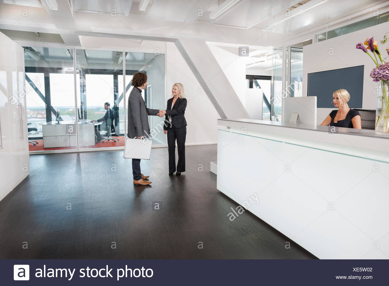 Male Office Receptionist High Resolution Stock Photography and Images ...