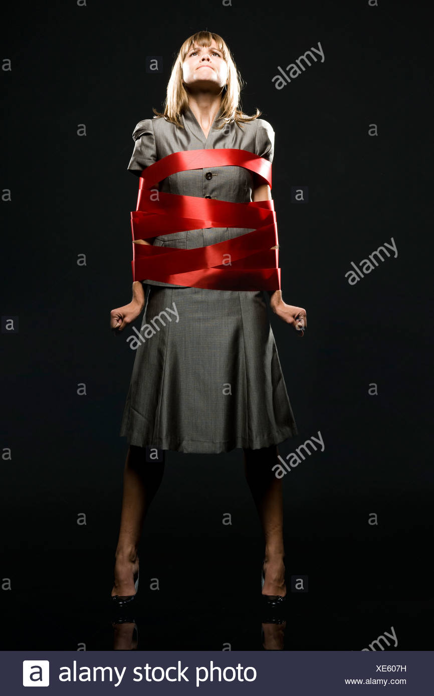 Woman Red Wrapped Tape High Resolution Stock Photography and Images - Alamy