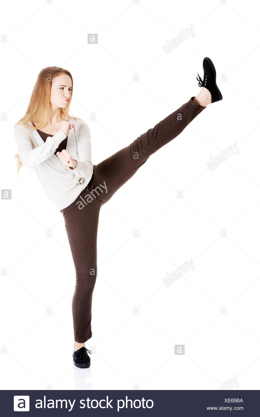 Woman Doing Karate Kick High Resolution Stock Photography and Images ...