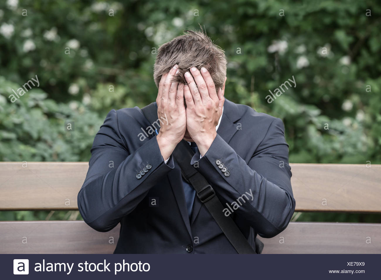 Sad Man Sitting On Bench Stock Photos & Sad Man Sitting On Bench Stock ...