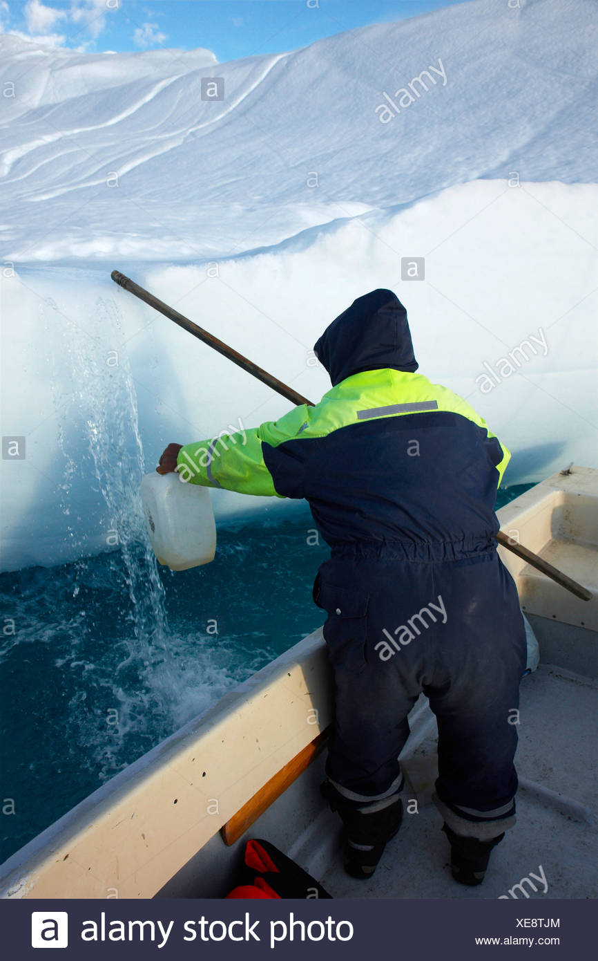 Inuit Collecting Water From Iceberg High Resolution Stock Photography ...