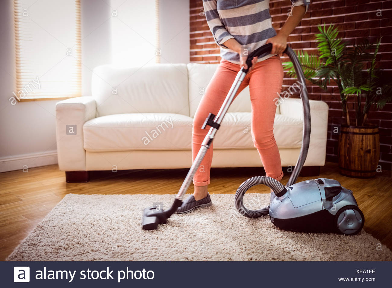 Hoovering High Resolution Stock Photography and Images - Alamy