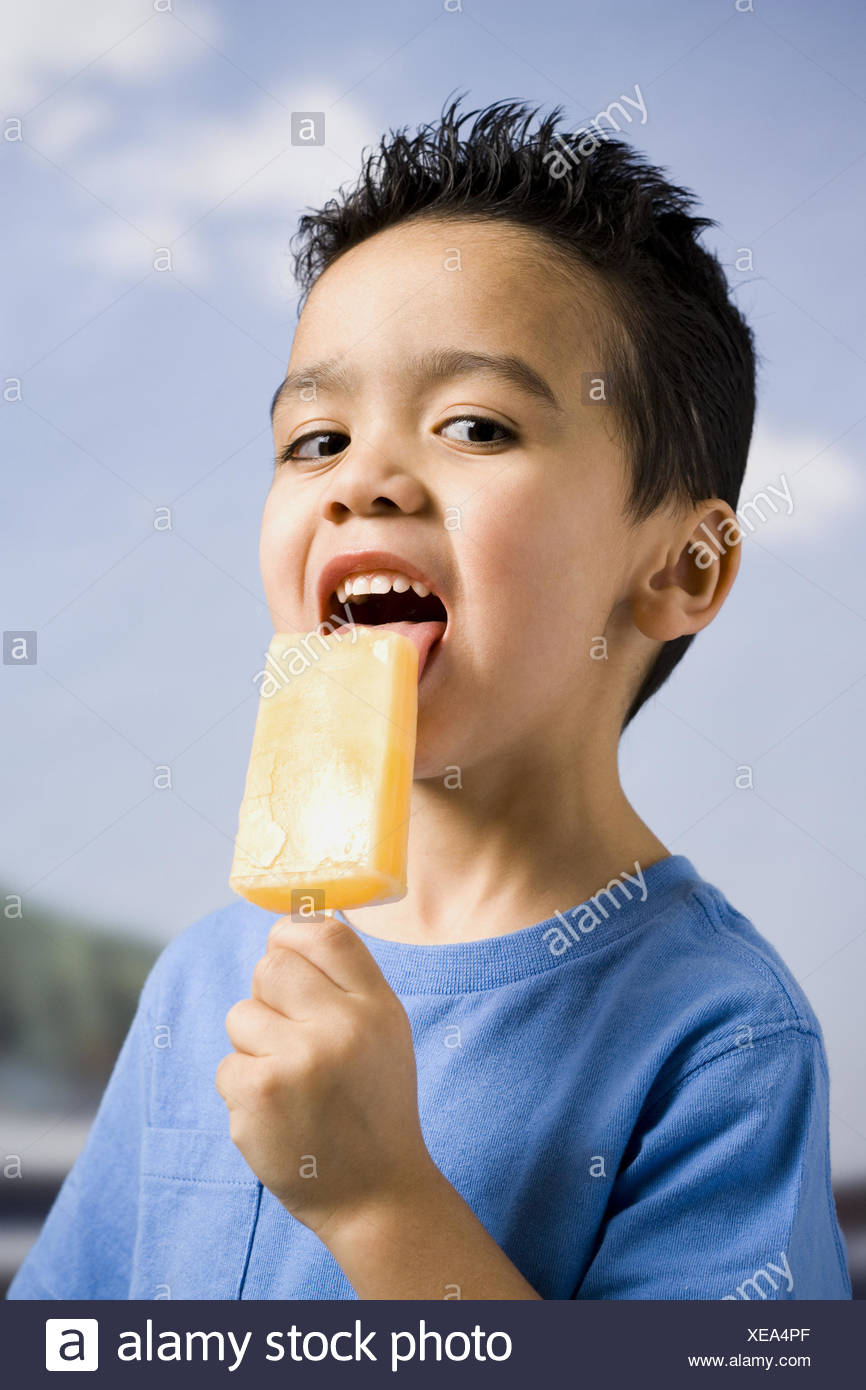 Boy Eating Popsicle High Resolution Stock Photography and Images - Alamy