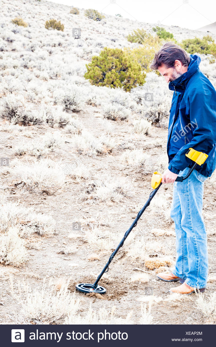 Man With Metal Detector Stock Photos & Man With Metal Detector Stock ...