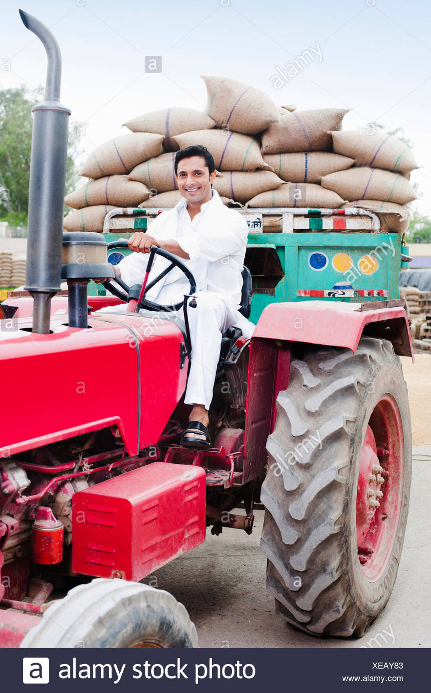 Man Driving A Tractor High Resolution Stock Photography and Images - Alamy