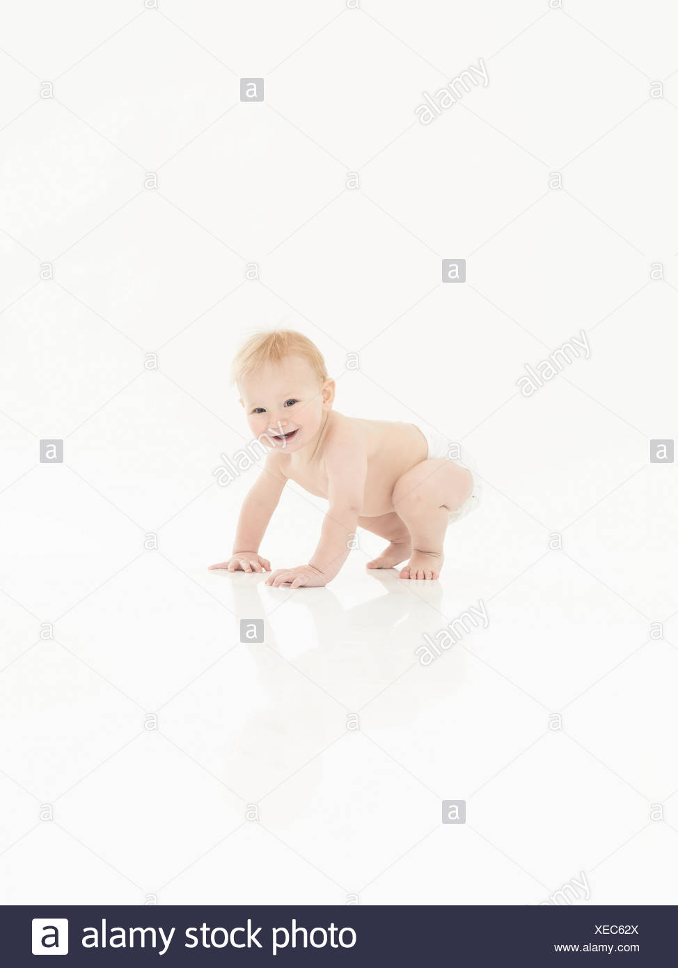 Crawling Baby In Diapers High Resolution Stock Photography and Images ...