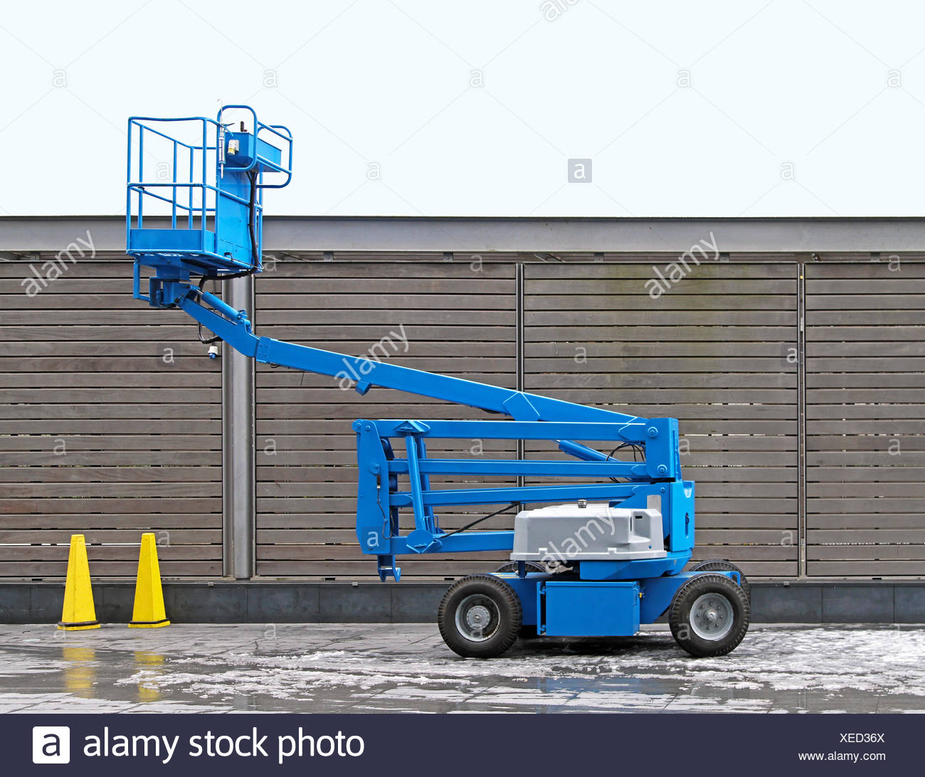 Blue Boom Lift High Resolution Stock Photography and Images - Alamy