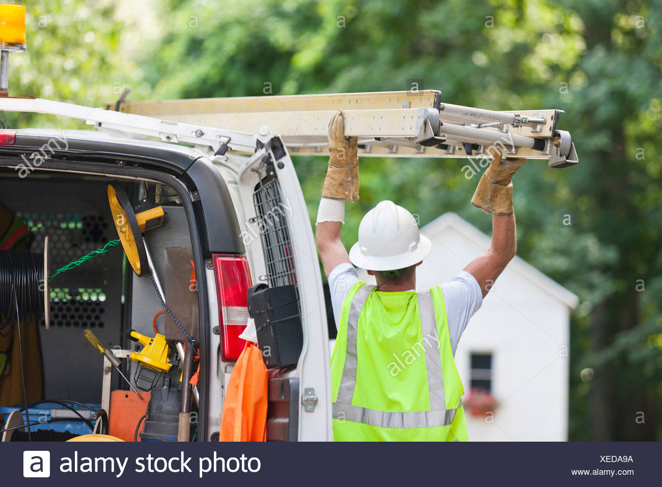 Cable Lineman Standing On Ladder High Resolution Stock Photography and ...