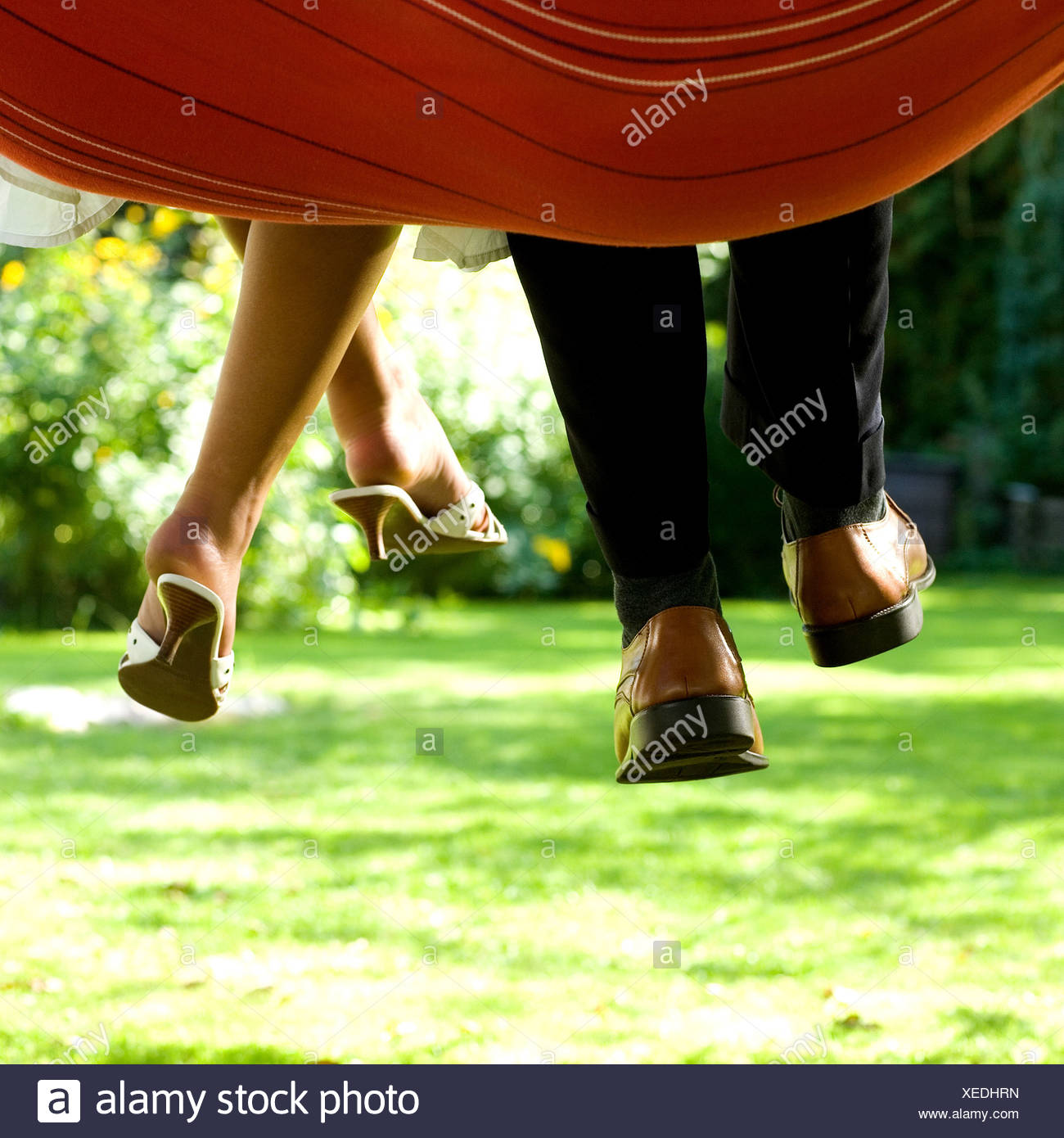 Woman Dangling Her Shoes Stock Photos & Woman Dangling Her Shoes Stock ...