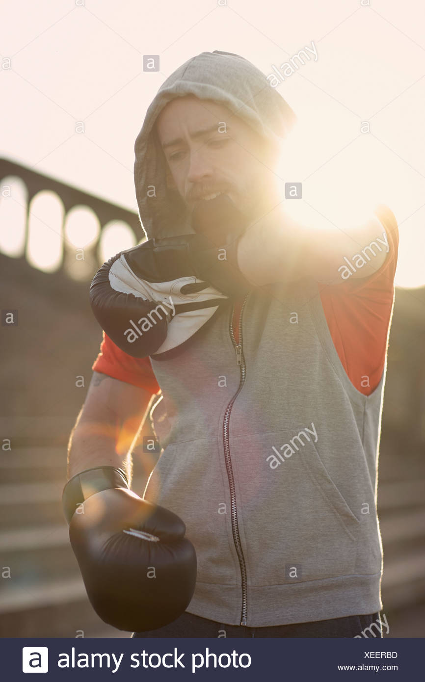 Man Wearing Boxing Gloves Stock Photos & Man Wearing Boxing Gloves ...