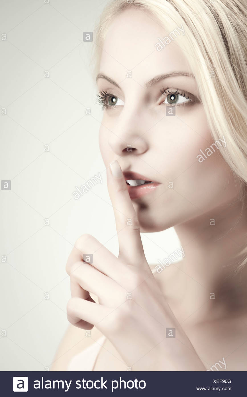 Finger On Lip High Resolution Stock Photography and Images - Alamy
