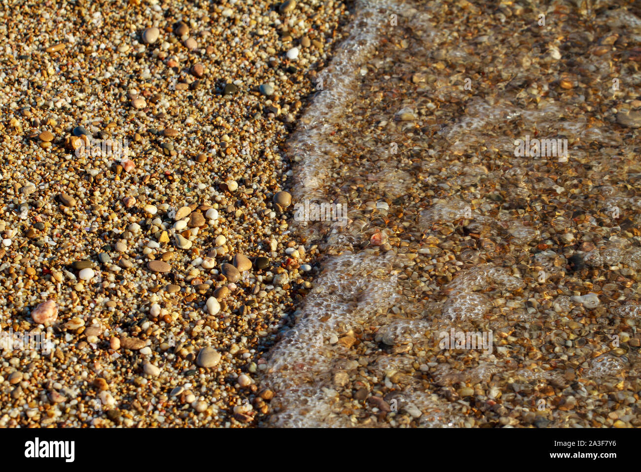 Meer Kieselsteinen farbige Granit am Strand Hintergrund Steine. Der ...