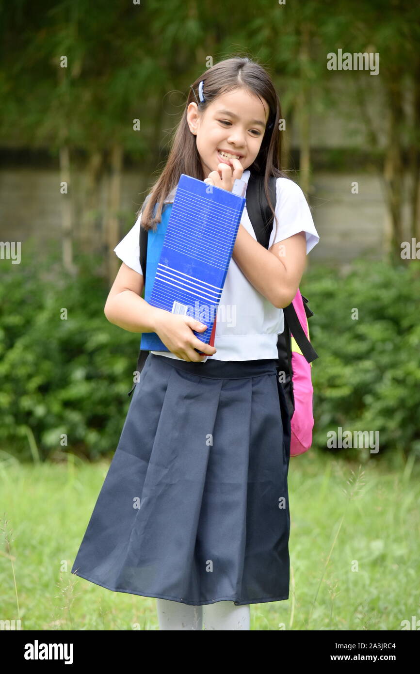 Shy girl school -Fotos und -Bildmaterial in hoher Auflösung – Alamy