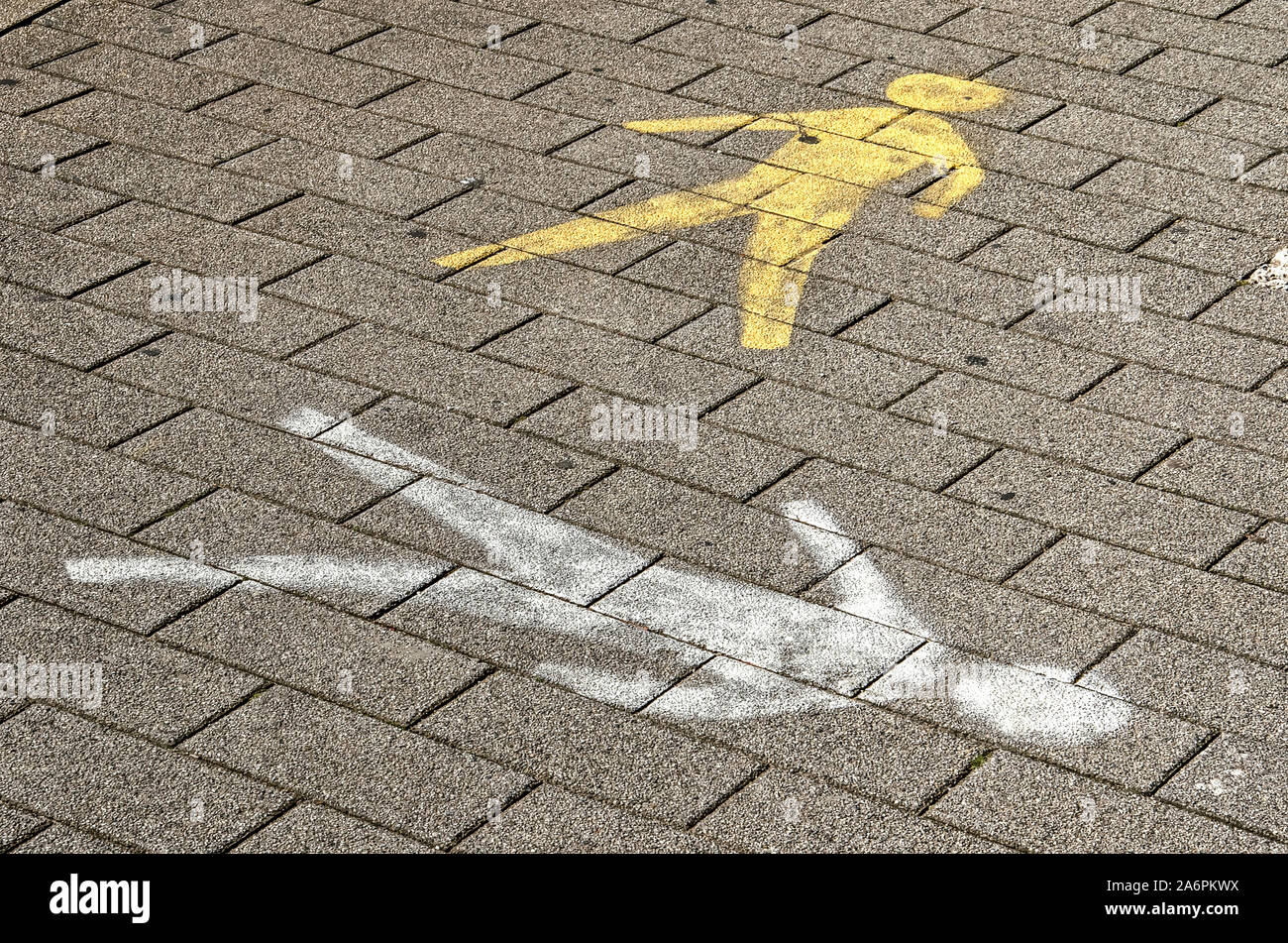 Zwei Fußgänger Symbole in verschiedenen Farben und Richtungen auf einem ...