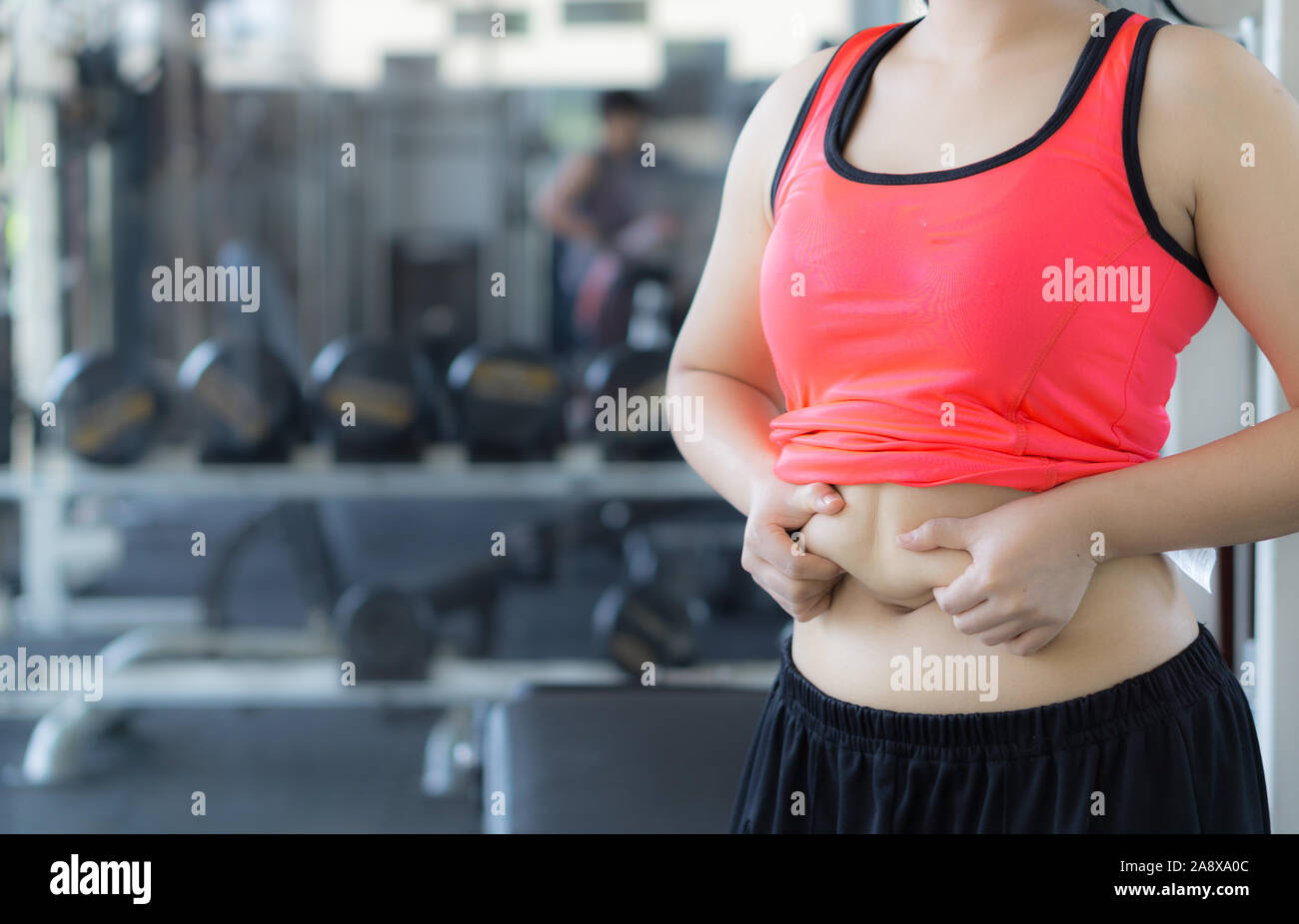 Fetter bauch frau -Fotos und -Bildmaterial in hoher Auflösung – Alamy