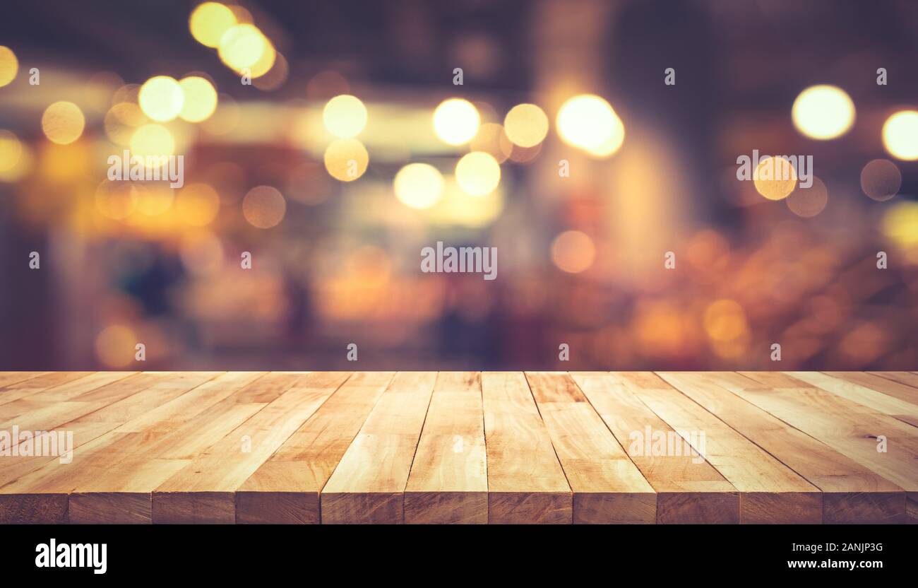 Holz Textur Tischplatte (Bar) mit blur Licht gold Bokeh im Cafe ...