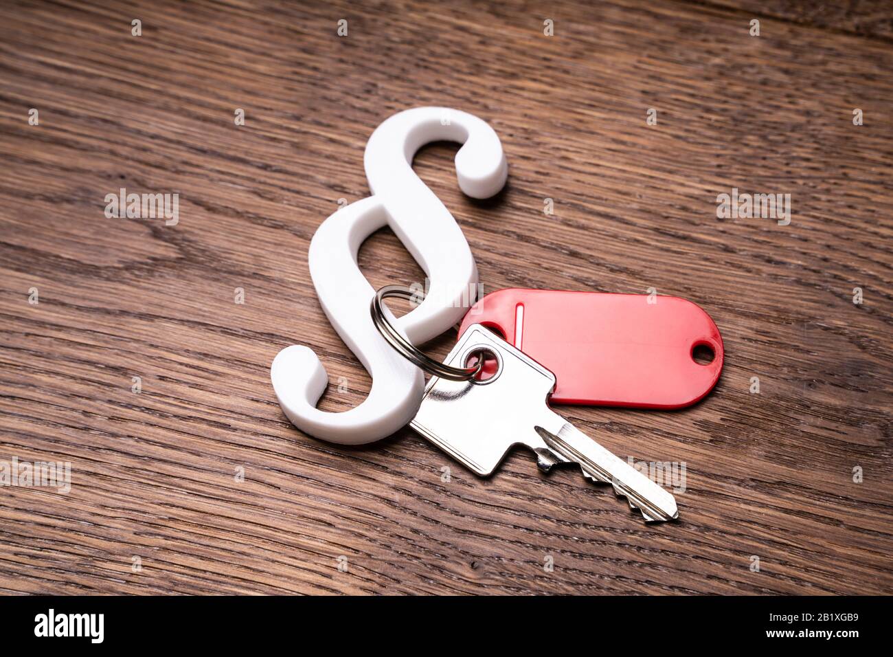 Hausschlüssel Und Gesetz Absatz Symbol Auf Tabelle Stockfotografie - Alamy