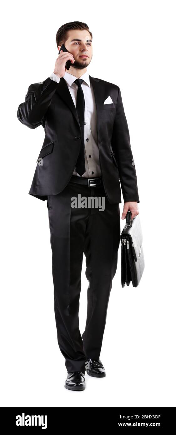 Eleganter Mann im Anzug mit Handy und Aktentasche isoliert auf weiß ...