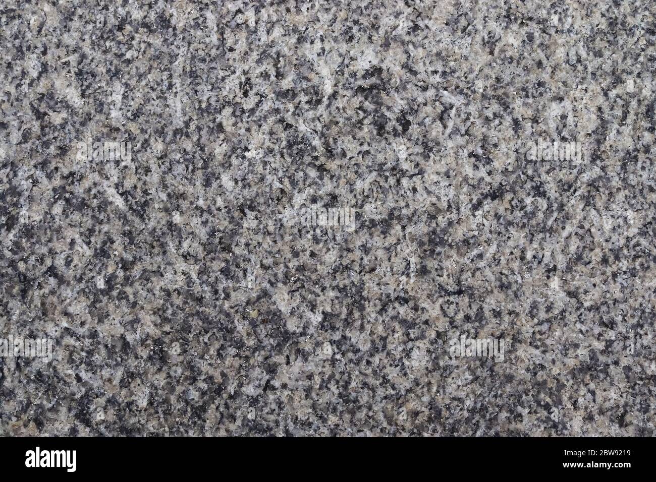 Granitstein-Textur in einer detaillierten Nahaufnahme in hoher ...