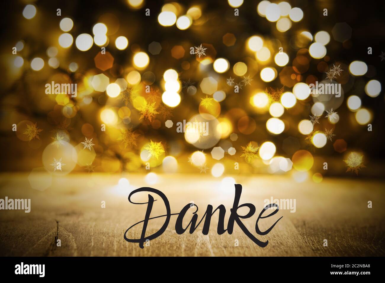 Deutsche Kalligraphie Danke, Danke. Golden Lights Textur mit Bokeh ...
