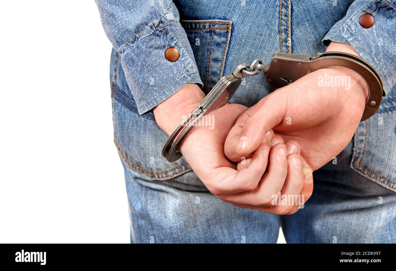 Männer mit handschellen -Fotos und -Bildmaterial in hoher Auflösung ...