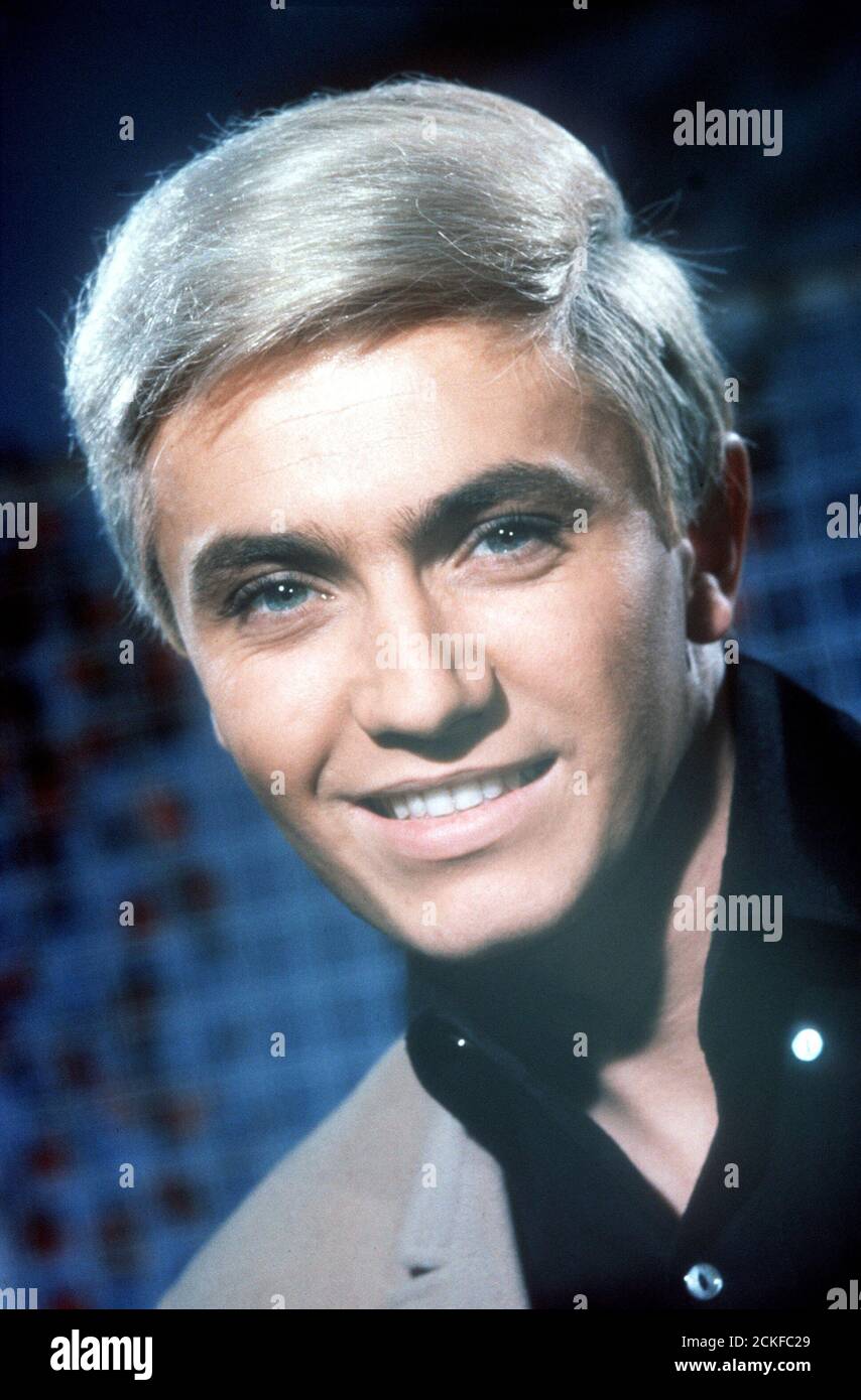 REX GILDO, Studioaufnahme mit Perücke aus den 1960er Jahren. REX GILDO ...