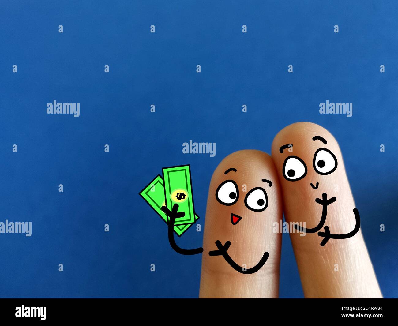 Zwei Finger sind als zwei Personen dekoriert. Einer von ihnen hat extra ...