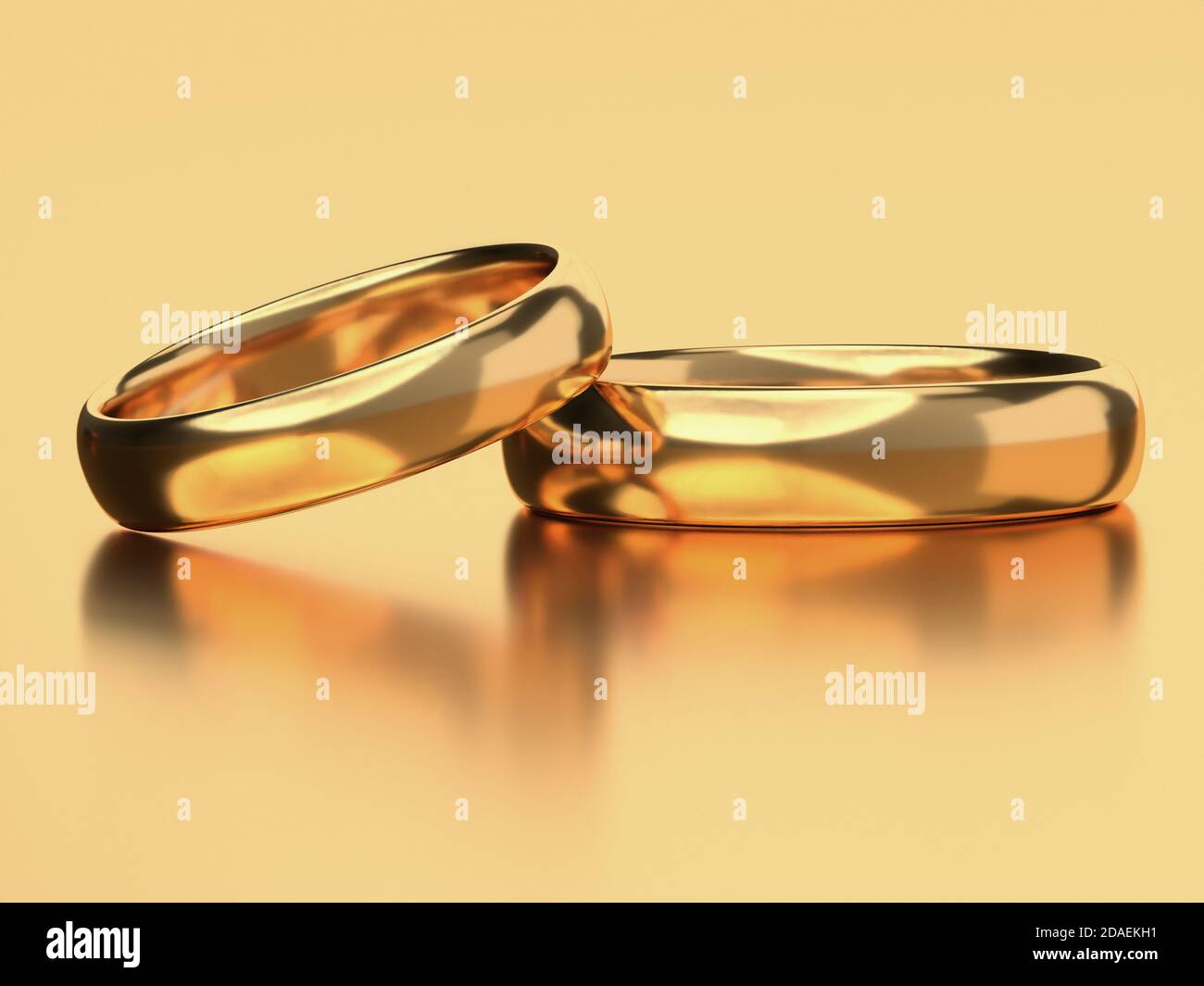 Zwei goldene Eheringe liegen nebeneinander. Liebeskonzept. 3d-Rendering ...