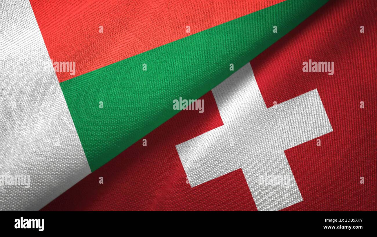 Madagaskar und die Schweiz zwei Flaggen Textiltuch, Stoff Textur ...