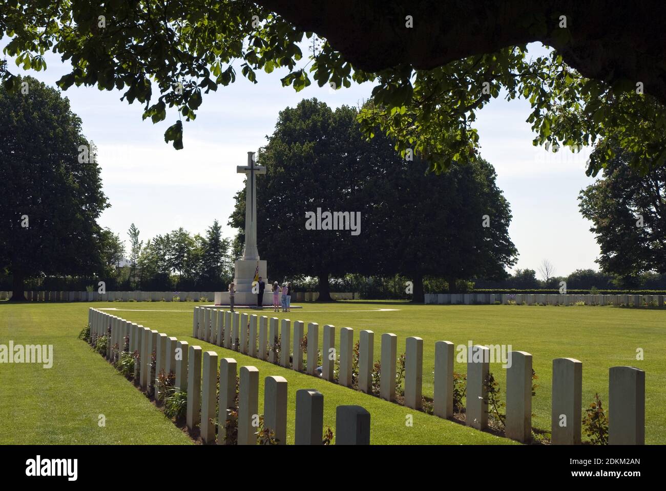 A British veteran and children march with a flag to the Cross of Sacrifice at the Bayeux ...