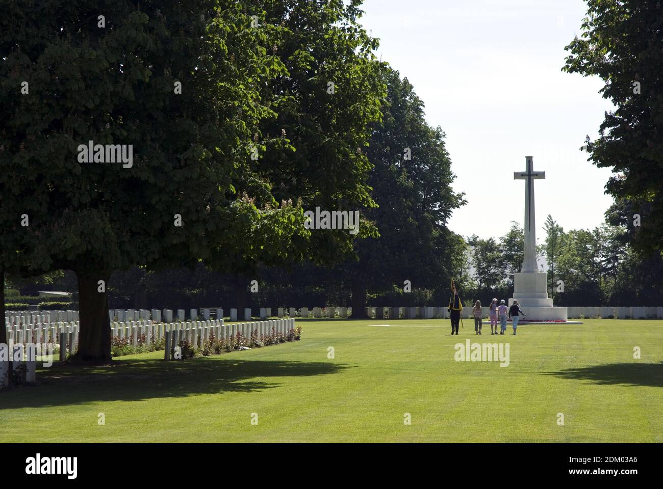 A British veteran and children march with a flag to the Cross of Sacrifice at the Bayeux ...