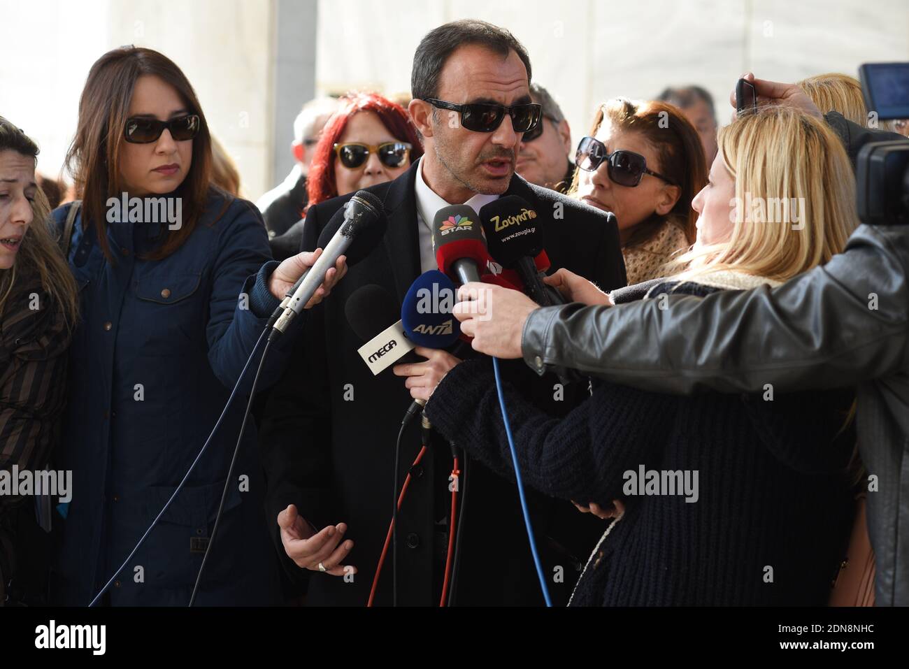 Nikos Aliagas attending the funeral of Greek singer Demis Roussos at ...