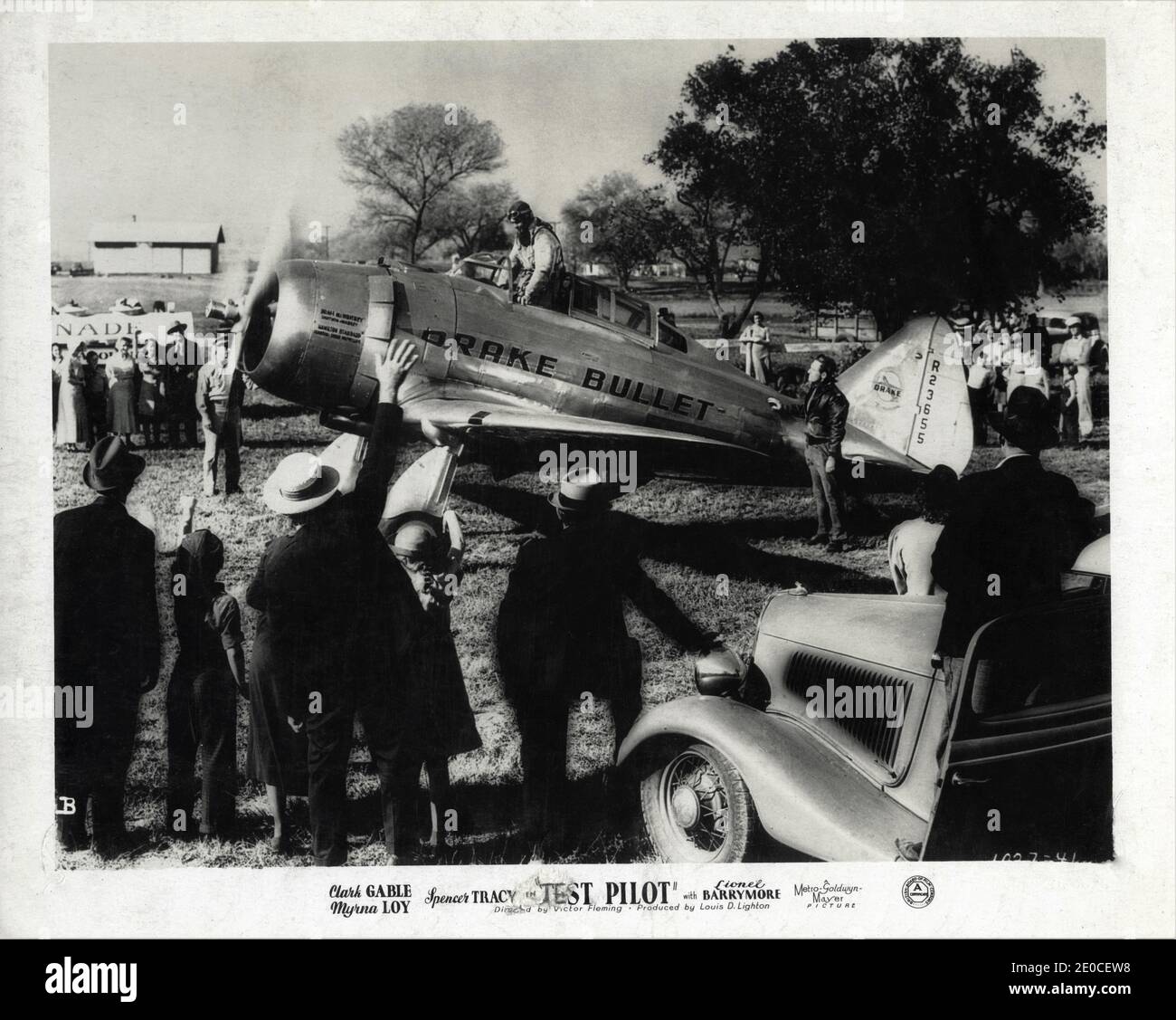 CLARK GABLE MYRNA LOY (Hintergrund hinter dem Flugzeug) Und SPENCER ...