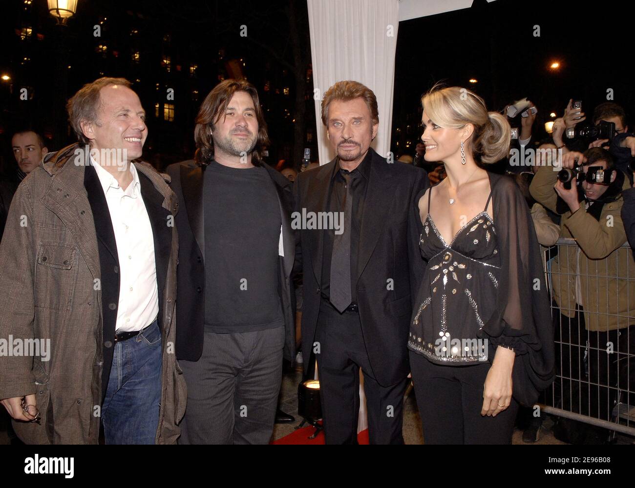 Die Stars des Films Fabrice Luchini und Johnny Hallyday mit seiner Frau ...