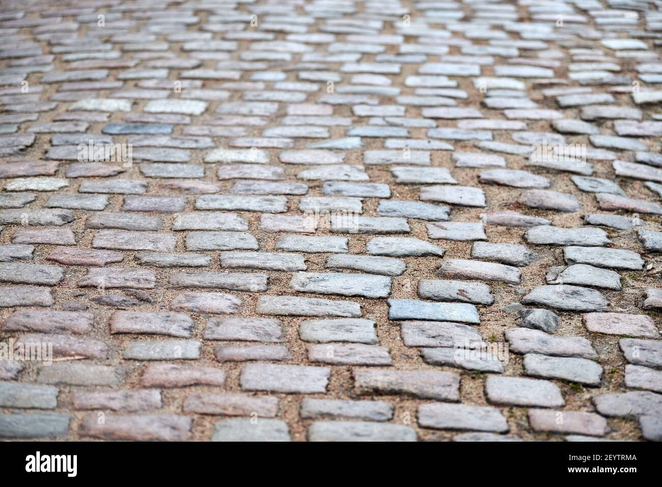 Pflastersteine an der Stadtstraße. Alte deutsche Pflastersteine Textur ...