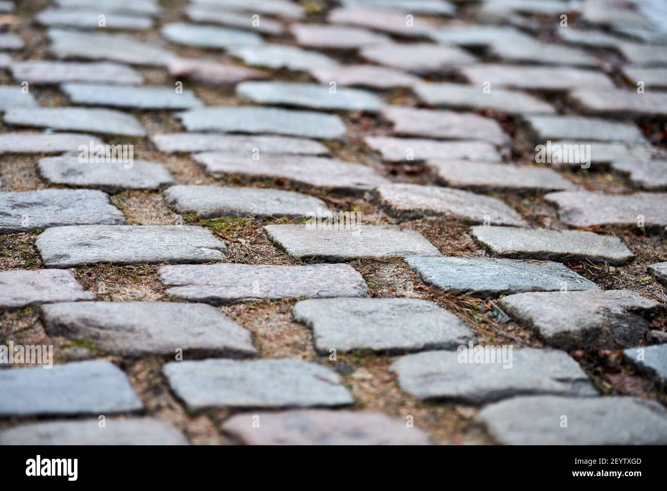 Pflastersteine an der Stadtstraße. Alte deutsche Pflastersteine Textur ...