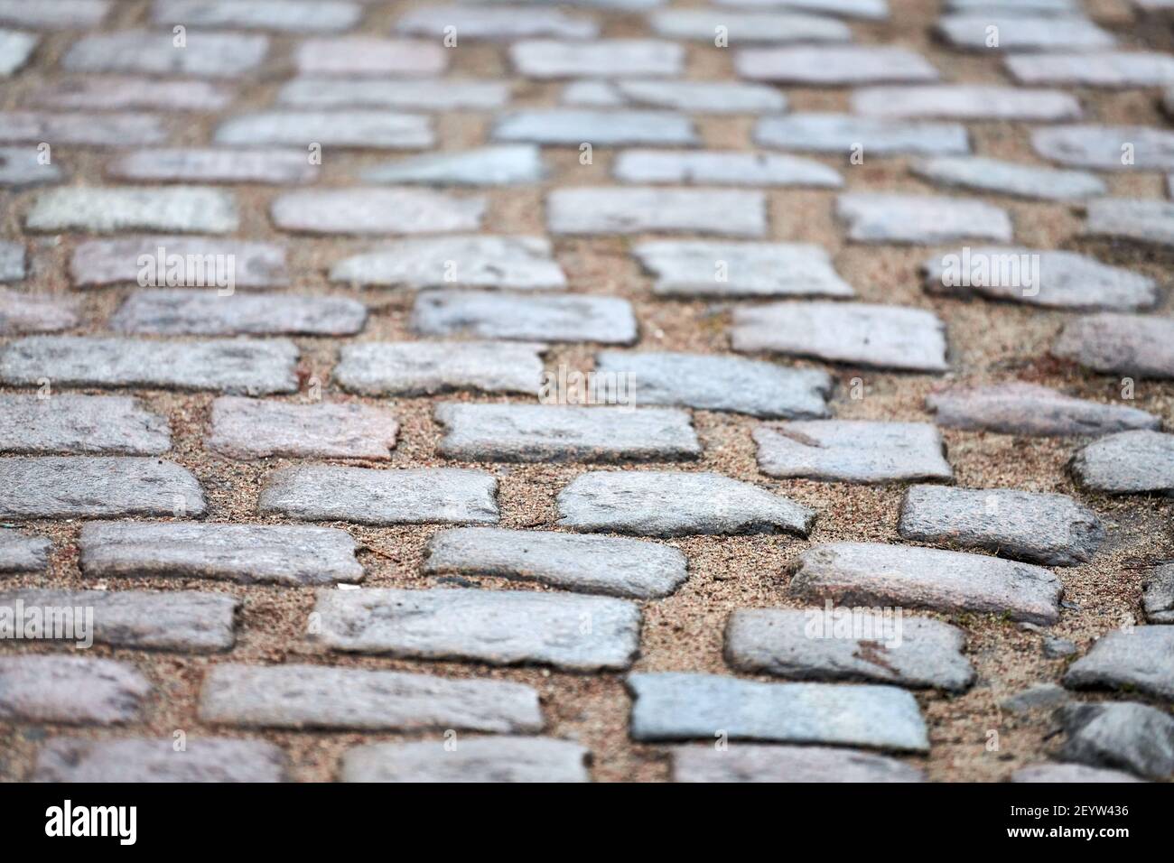 Pflastersteine an der Stadtstraße. Alte deutsche Pflastersteine Textur ...