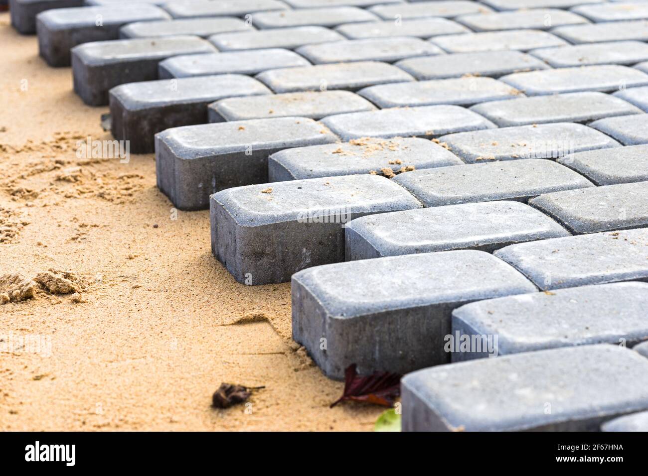 Neue Pflaster von Pflasterplatten, neue Straße gepflastert ...