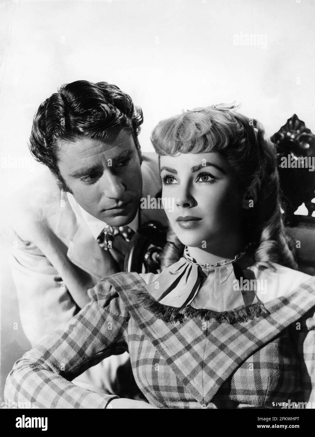 PETER LAWFORD als Laurie und ELIZABETH TAYLOR als Amy Publicity ...