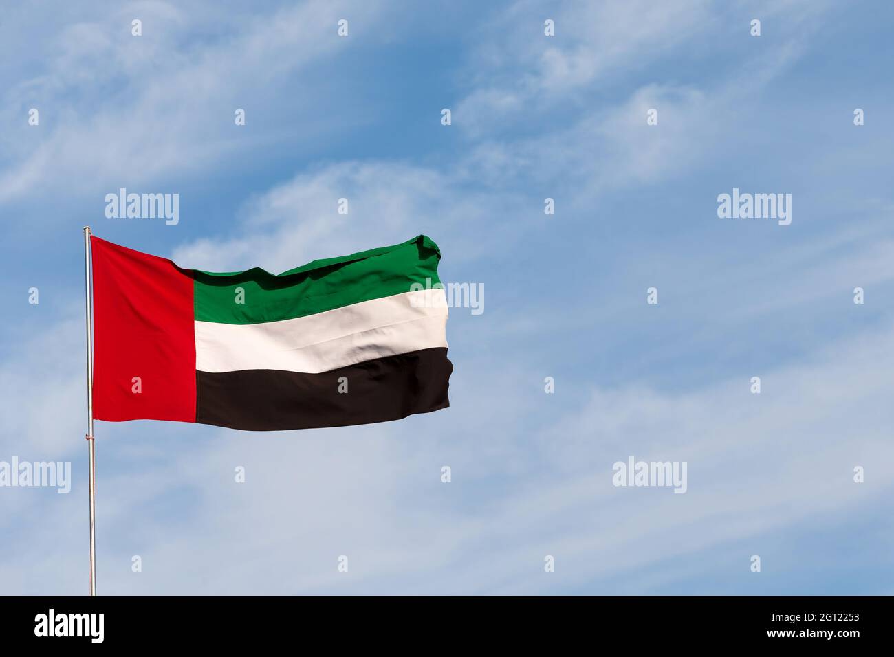 Die Flagge Der Vae Winkt Am Himmel, Nationales Symbol Der Vae. Tag Der ...